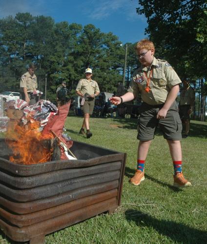 Solemn ceremony marks flag retirement | Archives | sanfordherald.com