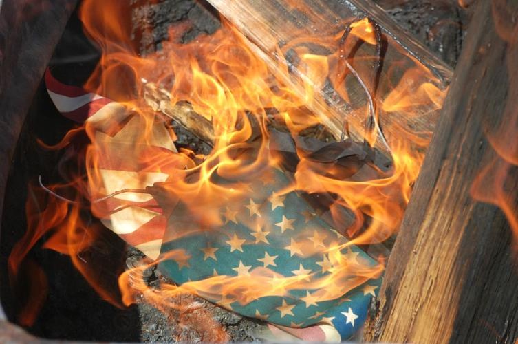 Solemn ceremony marks flag retirement | Archives | sanfordherald.com