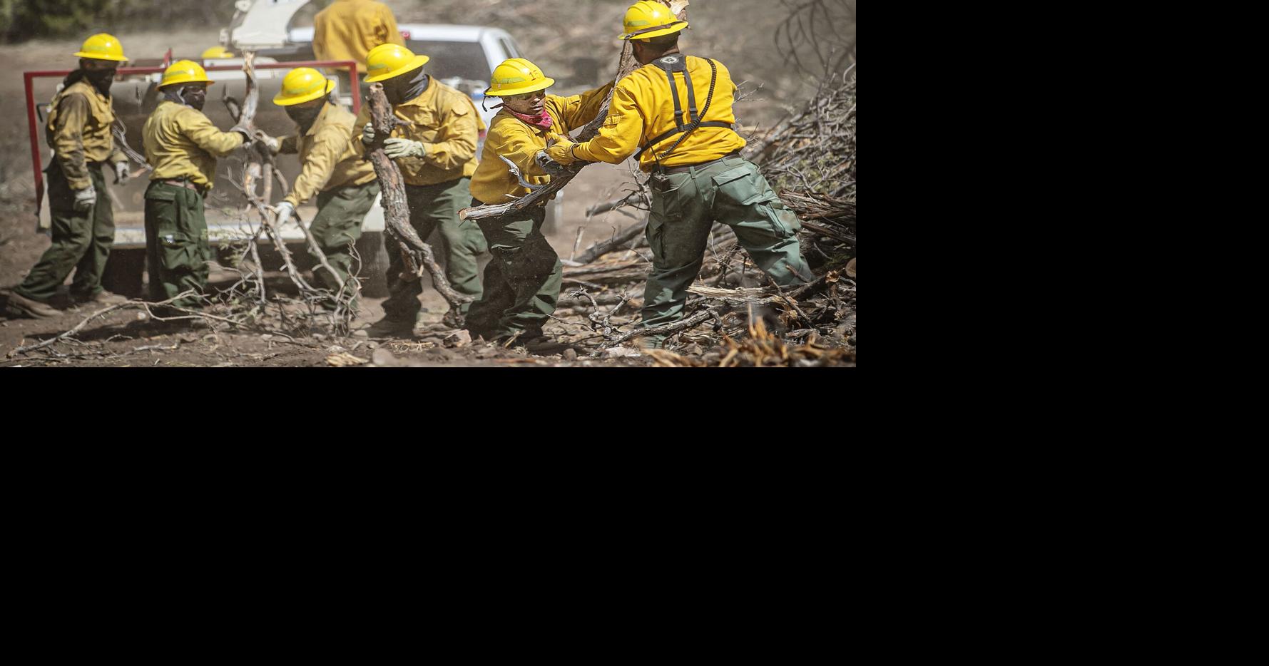 After wildfire, crews begin overlooked work of removing defensive lines ...
