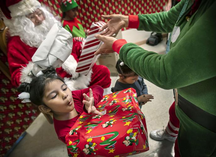 Española charity restores children's smiles with Santa visit, Christmas ...