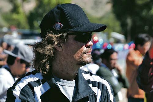 In tiny Escalante, where football is king, Giles guides tough athletes ...