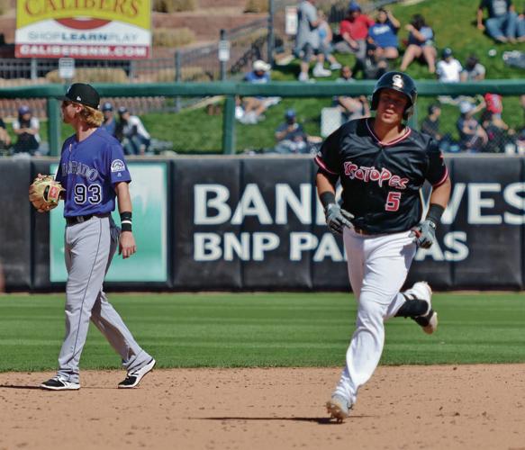 Over 12,000 pack Isotopes Park to watch exhibition game against Rockies ...
