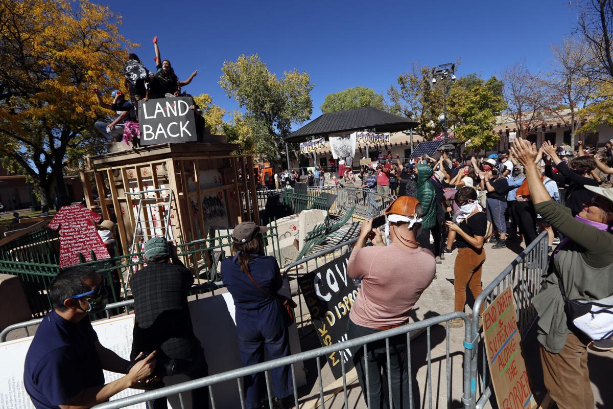 Protesters tear down obelisk in Santa Fe Plaza | Local News ...