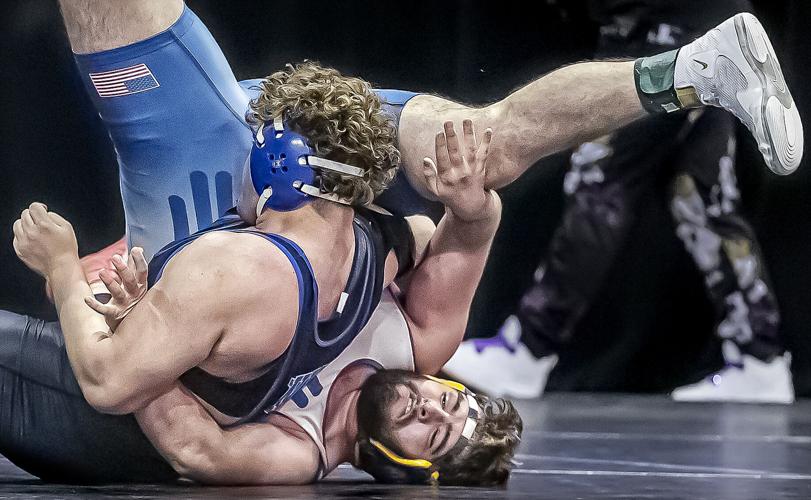 One of the state's top wrestlers has his eyes on a Santa Fe High legend ...