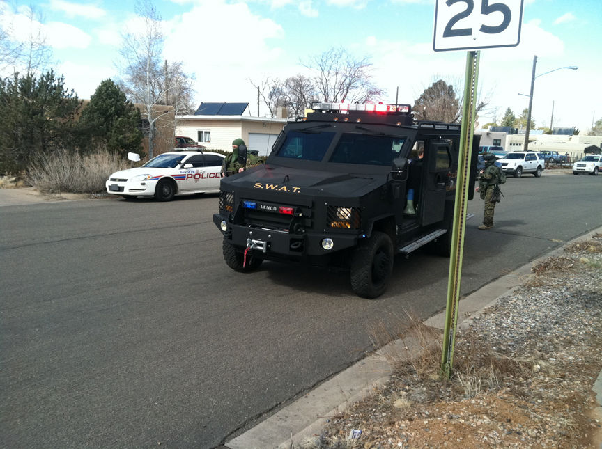 Suspected fugitive in custody after SWAT standoff | Local News ...
