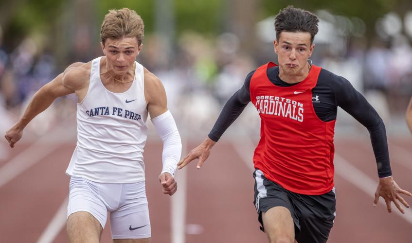 St. Michael's makes it five straight titles by holding off Robertson ...