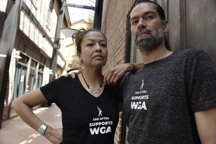 Striking local screenwriters fear Hollywood won't budge on AI dispute ...