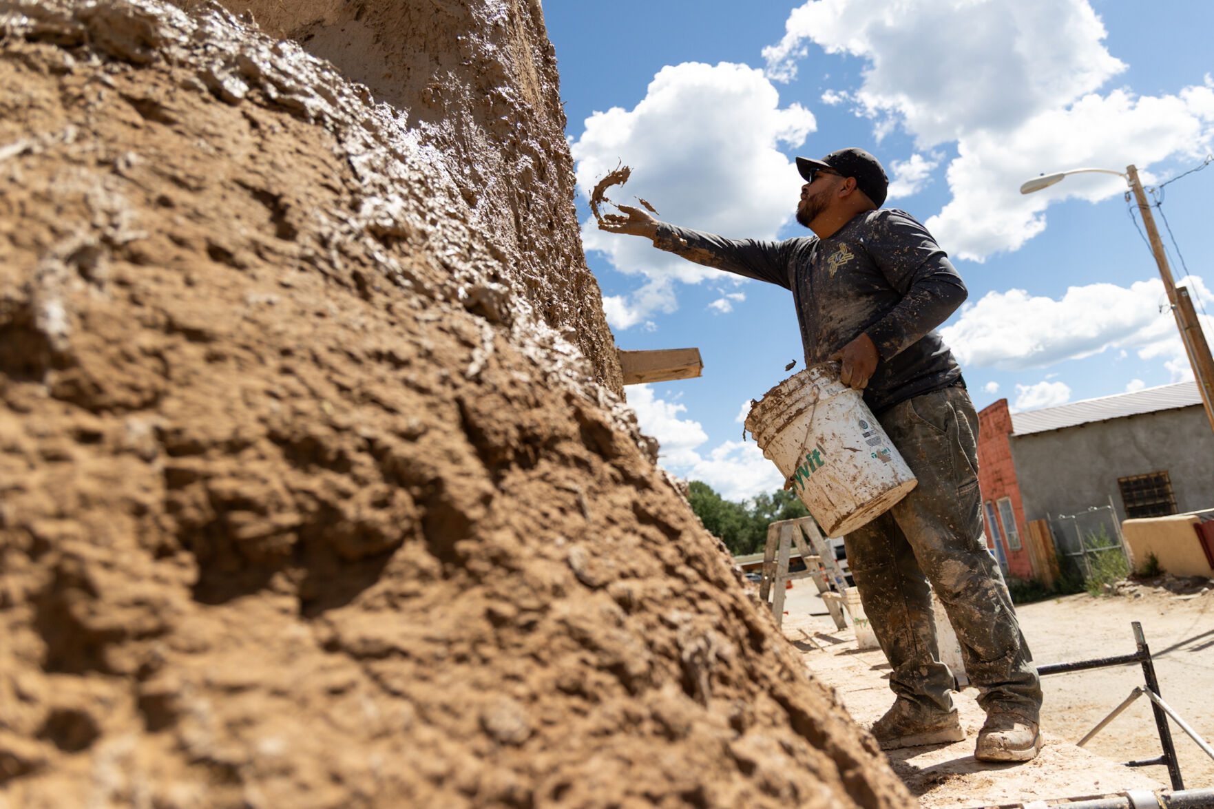 Throwing mud: Enjarre resumes at historic Ranchos church | Local News ...