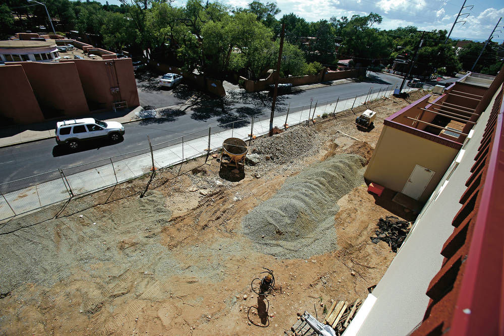 State sues builder over sinking parking garage | Local News ...