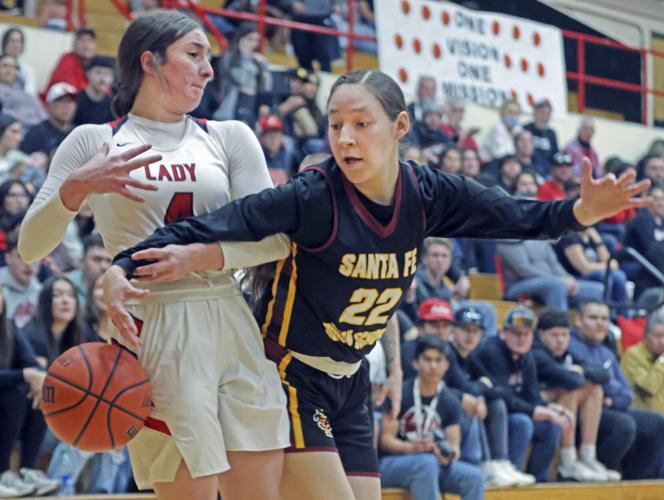 Robertson narrowly defends 2-3A title with win over Santa Fe Indian ...