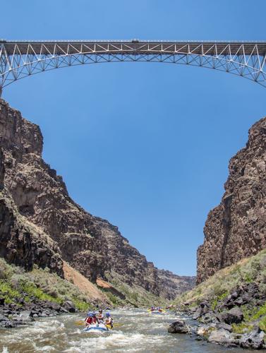 Outfitters seize brief window to raft Taos Box following year of low ...