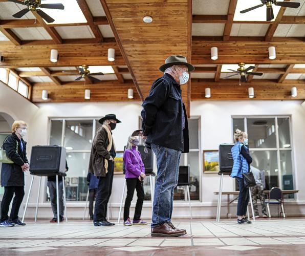 Even when it was slow going, people trekked to the polls in Santa Fe ...