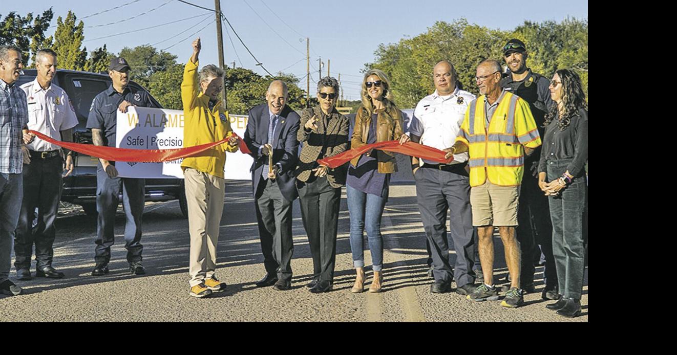 Alameda Street reopens with a ribbon-cutting, fire truck and flag ...