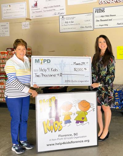 MPD Electric Cooperative Gifts $2,000 to Help4Kids