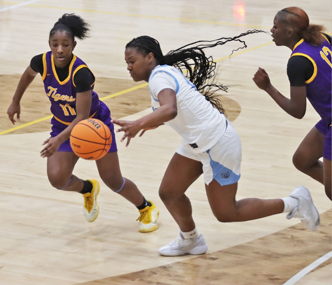 Scenes from Friday's basketball games involving Wilson at South Florence