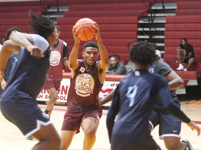 Former player D.J. Kelly named new Marion boys basketball coach