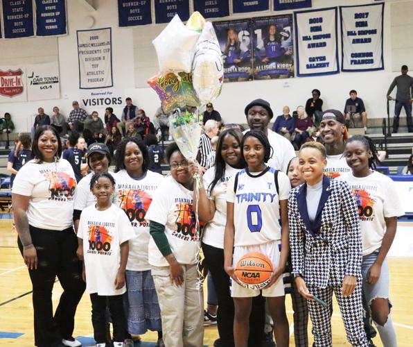 Trinity basketball splits, Legette reaches career milestone