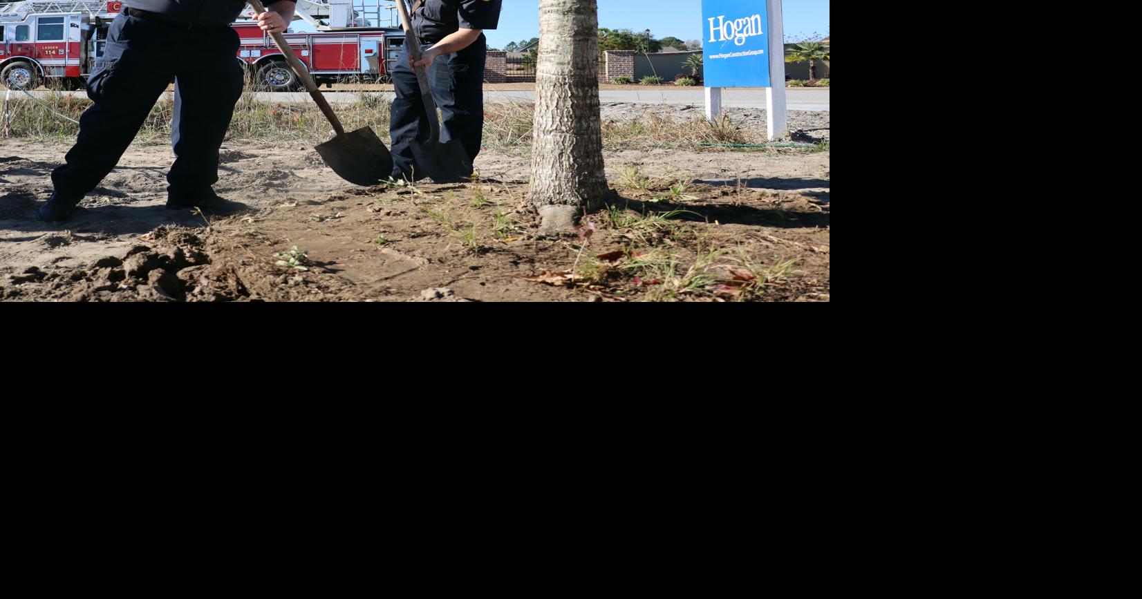 Florence marks Arbor Day by planting two oaks