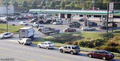 In Western NC, lines swell, fuel hunt grows