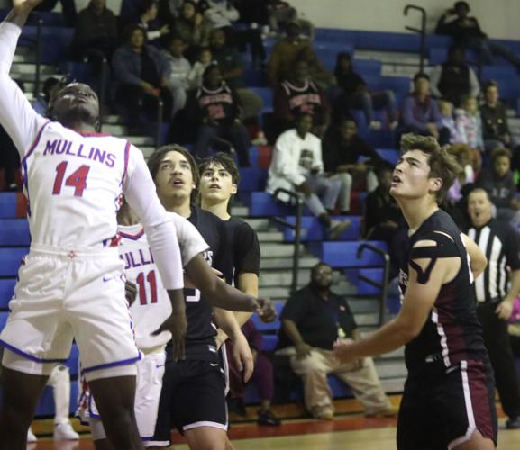Mullins rallies to beat Carolina Forest 61-60