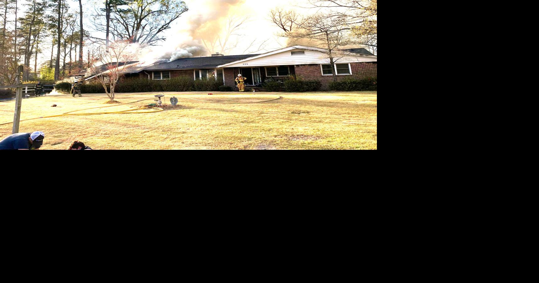 Local fire fighters battle Mullins house fire
