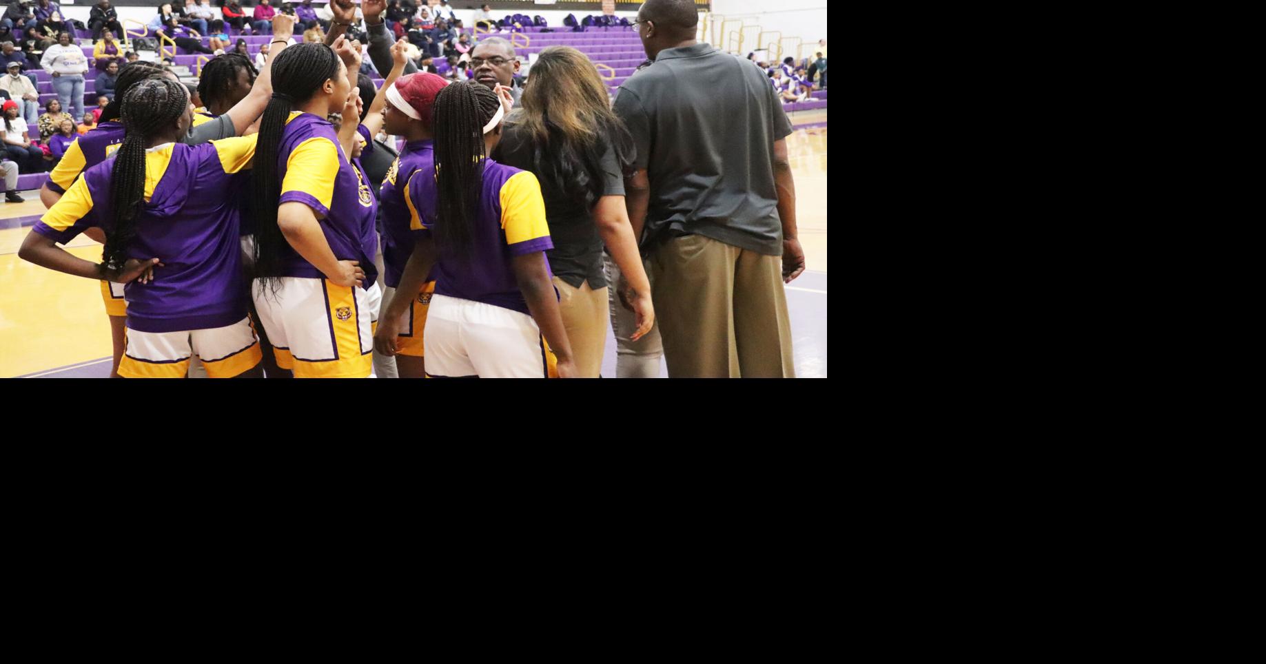 PHOTOS: Wilson vs. A.C. Flora Playoff Basketball