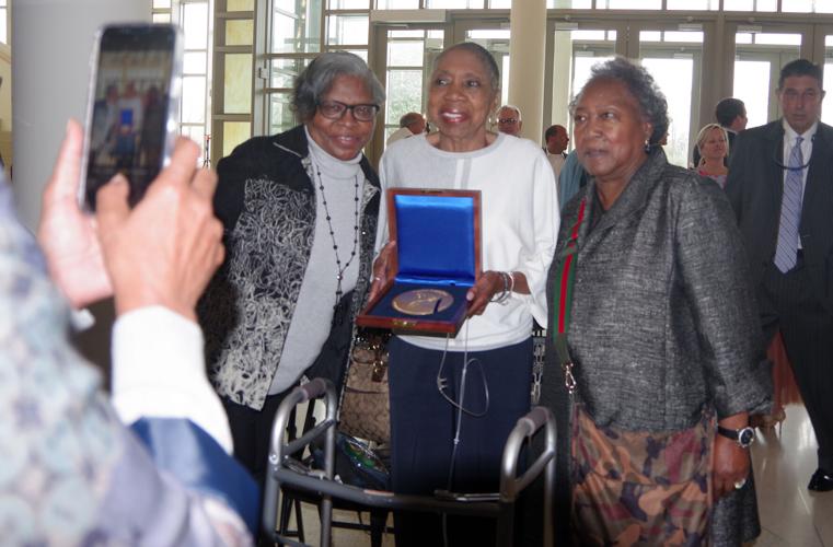 Moore, Norwood, Brown recognized with Marion Medallions