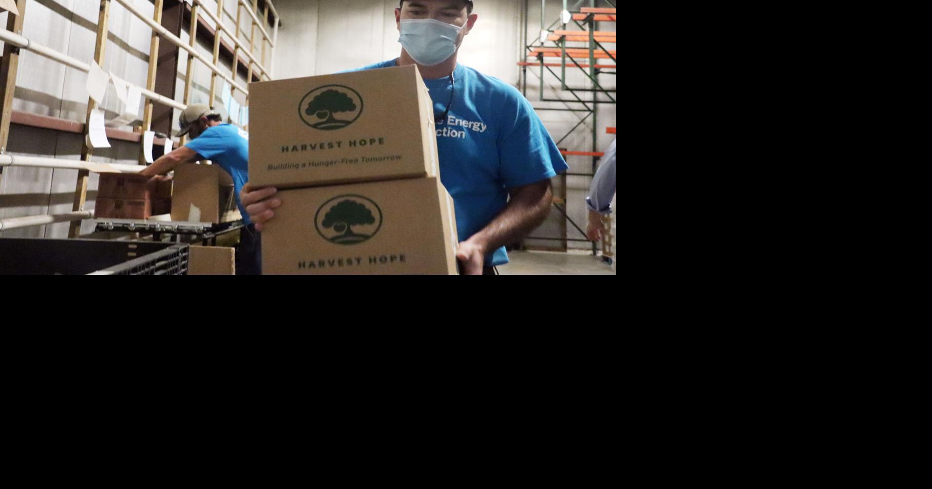 Duke Energy volunteers turn out to pack food boxes for Harvest Hope
