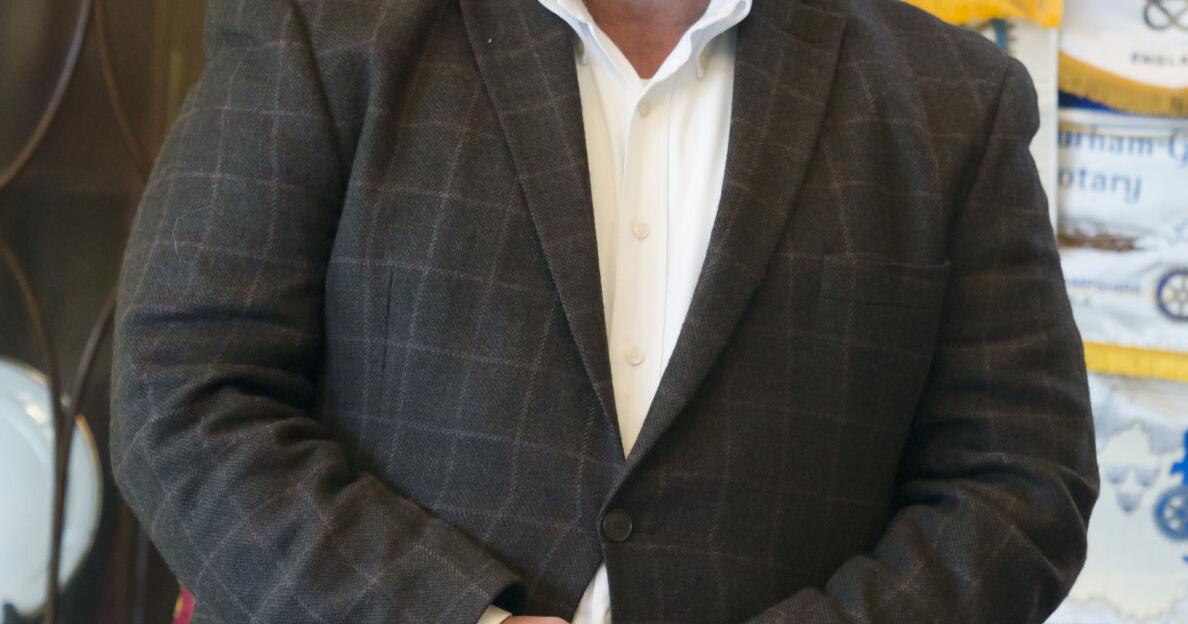 Bryan Braddock and William Schofield speak to Florence Rotarians