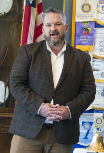 Bryan Braddock and William Schofield speak to Florence Rotarians