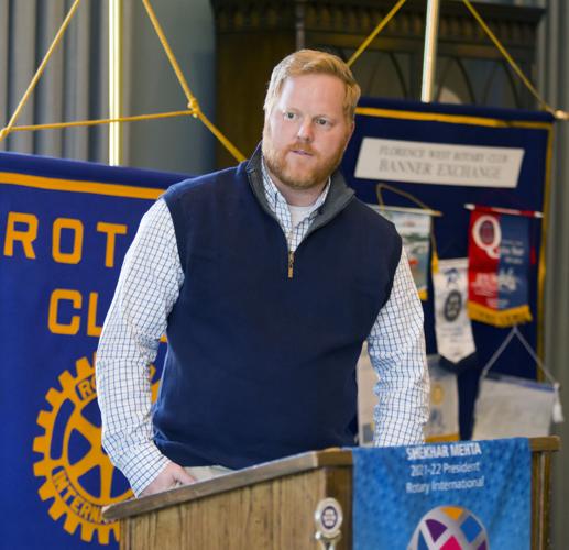 Bryan Braddock and William Schofield speak to Florence Rotarians