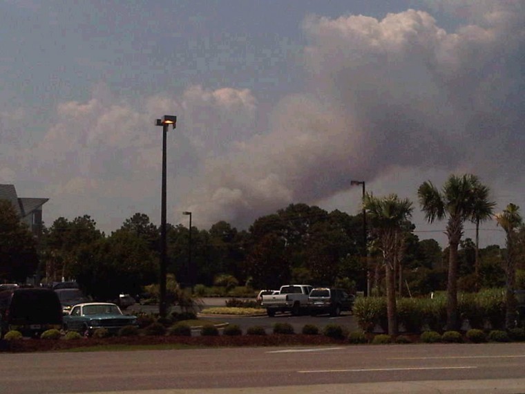 Crews work to contain Horry County woods fire