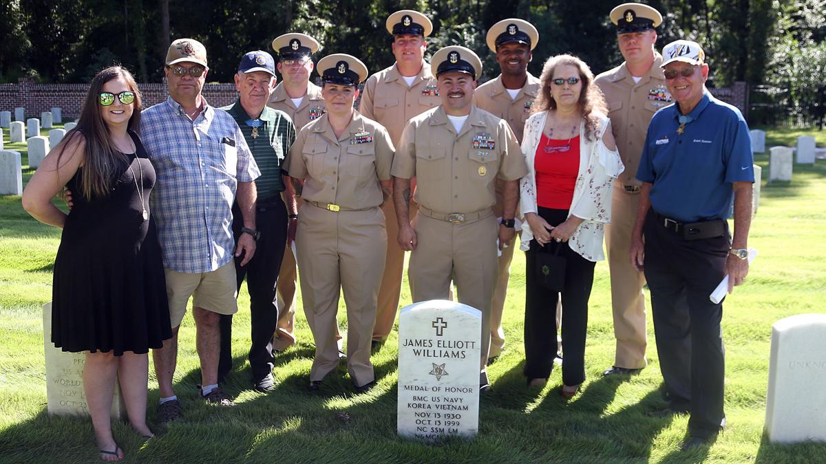 Ship's crew members pay respects to memory of James E. Williams