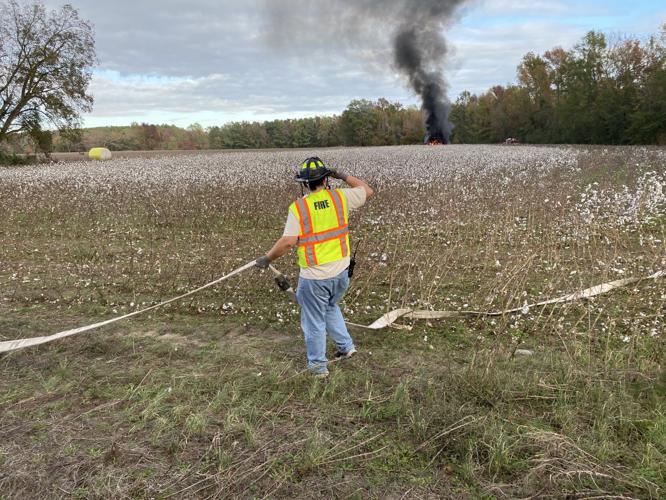 West Florence firefighters extinguish burning combine