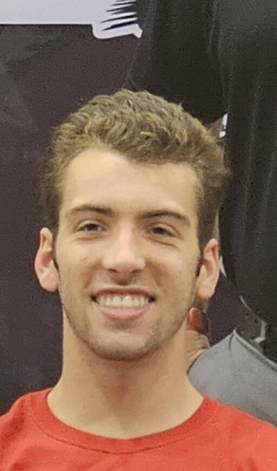 Ethan Hickey signs to run cross-country/track at FMU