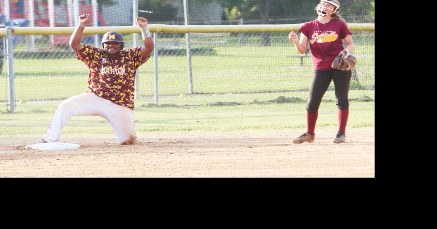 Marion baseball slugs it out with Lady Swamp Foxes softball team