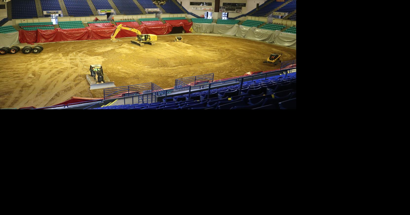 Arena floor transformed into Monster Jam playground