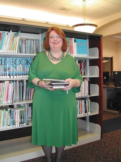 Quesada turns love of books, children into librarian career