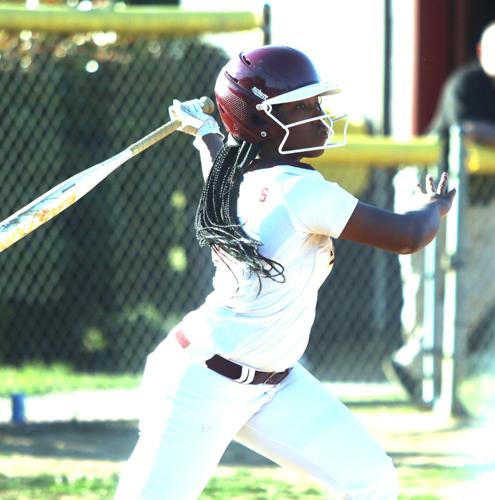 Marion Lady Swamp Foxes softball team competing for lower district title