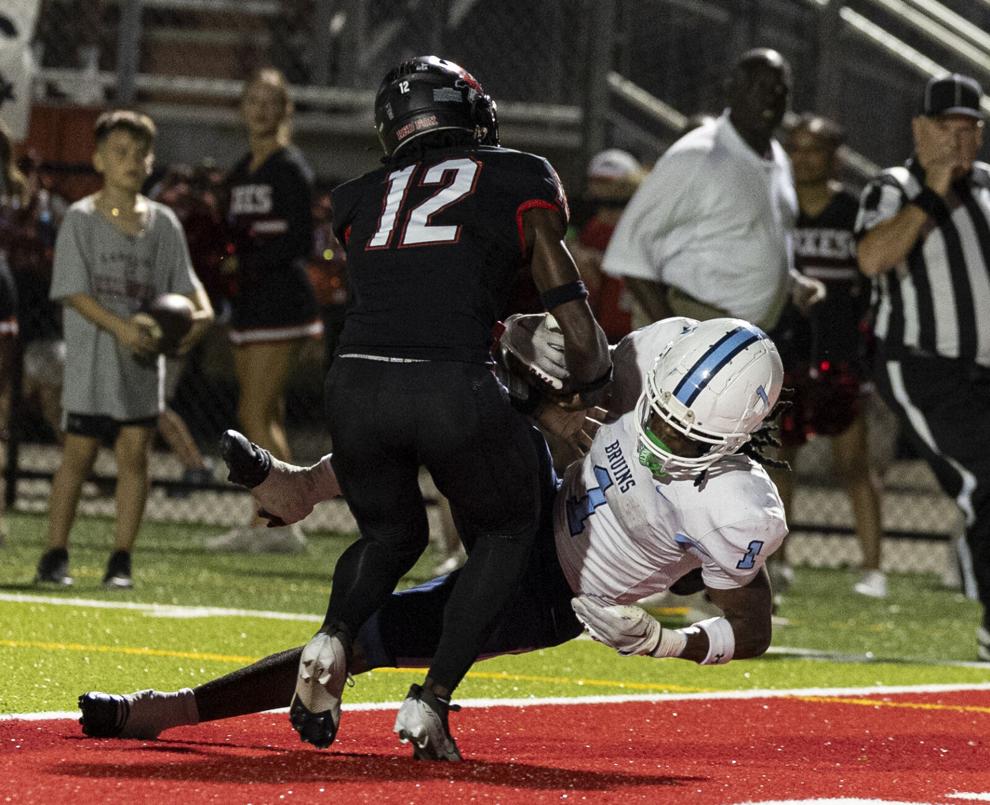 Hartsville football tops South Florence 54-35 to win region