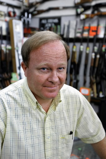 Charleston ex-pawnshop owner pleads to lesser charge