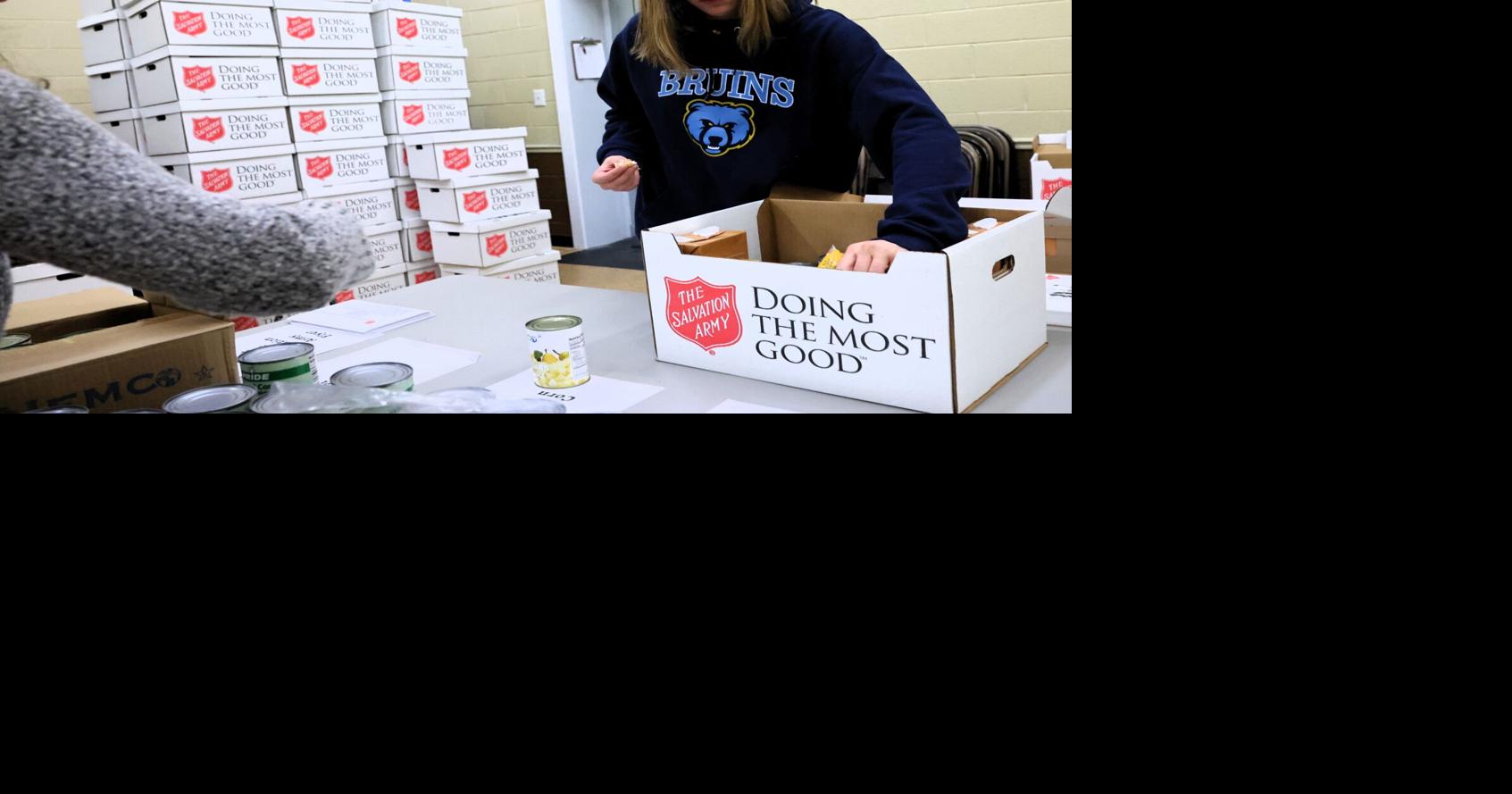 Home schoolers volunteer to pack Salvation Army food boxes