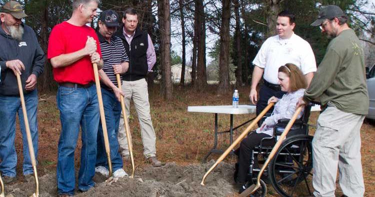Volunteers break ground on a new home for Tessie Smith