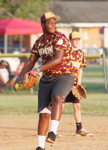 Marion baseball slugs it out with Lady Swamp Foxes softball team