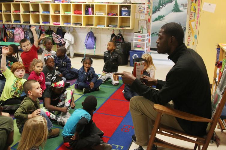'Real Men Read': Visitors set example at elementary school in Florence