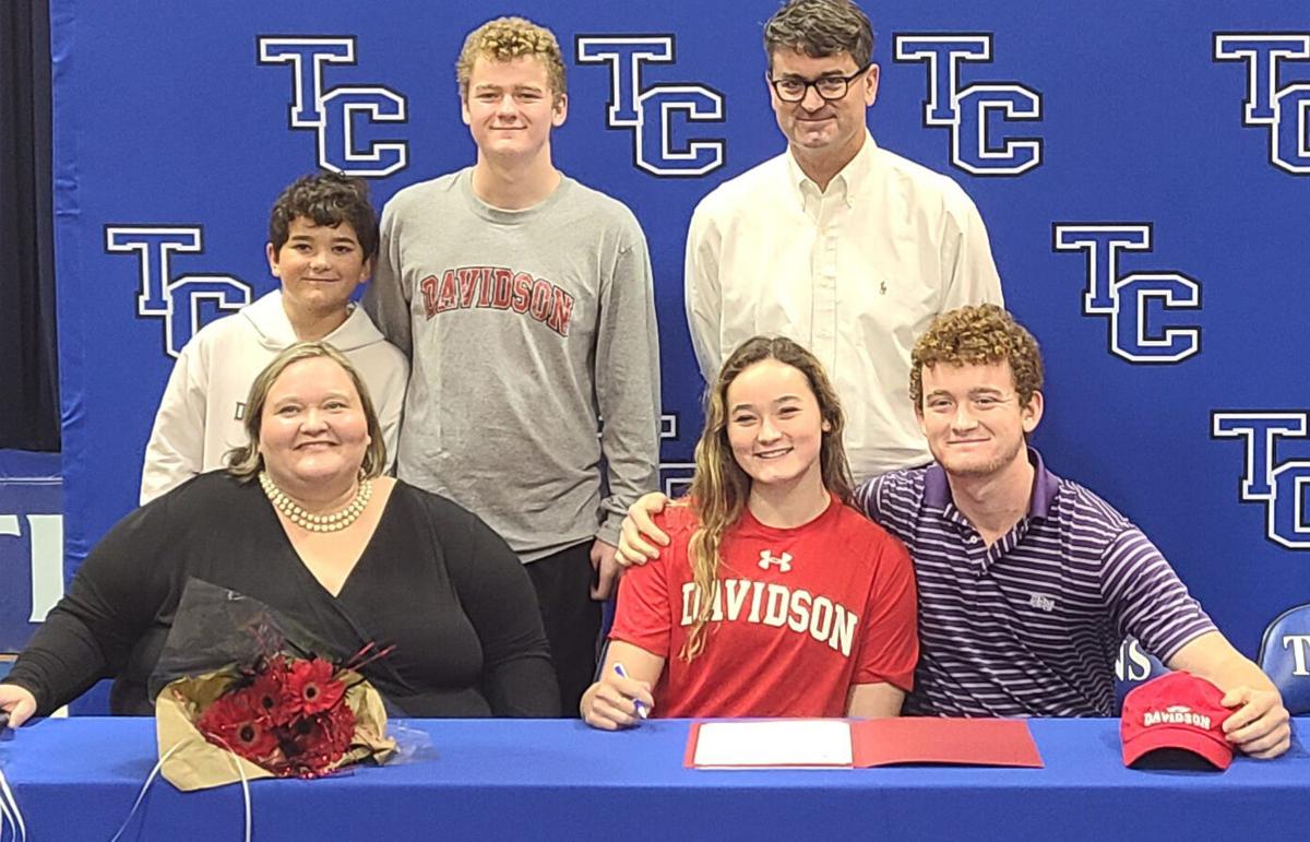 Trinity Collegiate's Cate Phipps signs to swim at Davidson