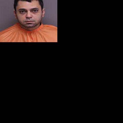 Florence Police arrest pharmacist, find pills in pockets