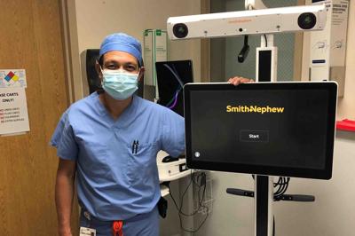 Local doc performs first robotic knee replacement | Neighboors ...
