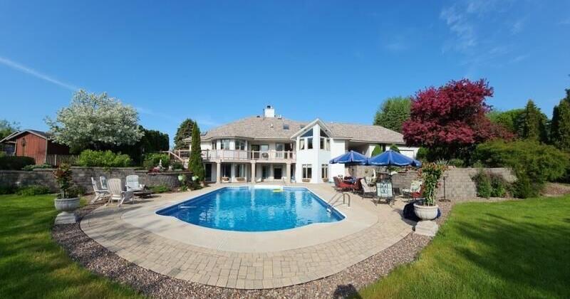Take a dip in the refreshing in-ground pool with finished walkout on ...