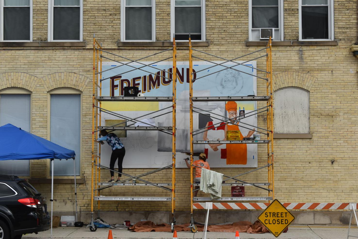 See 20 photos of the Walldogs mural artists in action in downtown ...